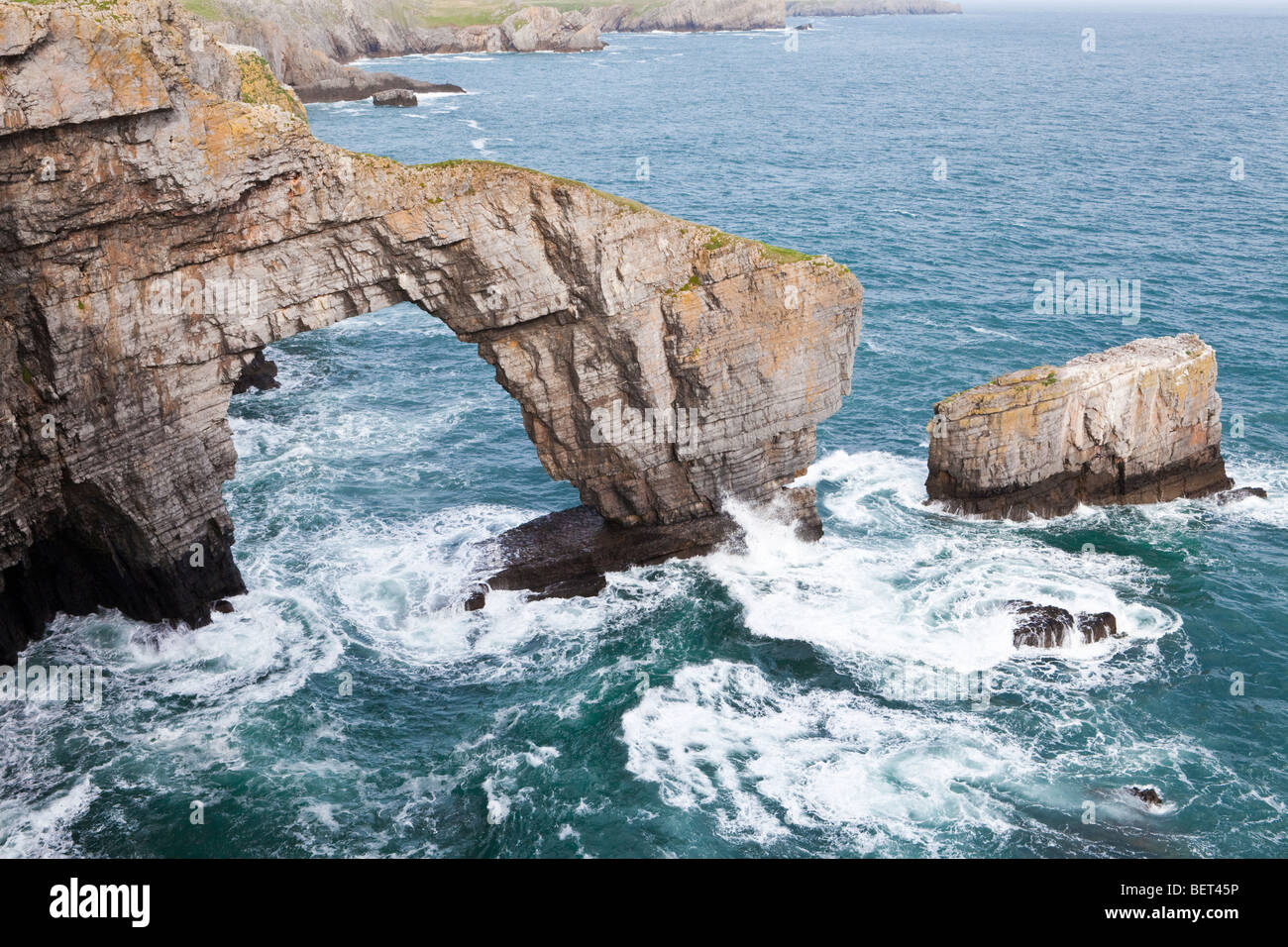 The Green Bridge of Wales, a natural rock arch in the Pembrokeshire ...
