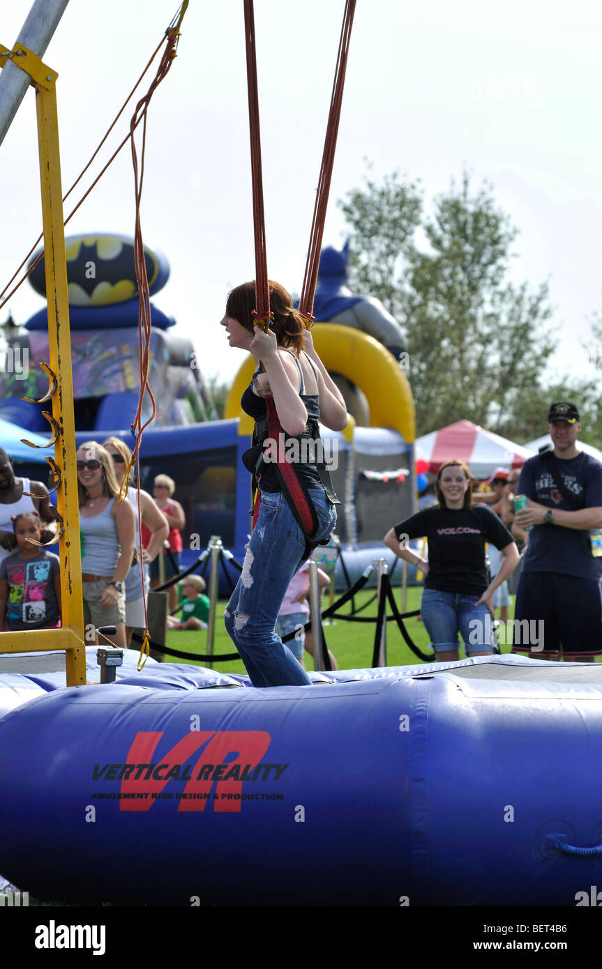 Girl enjoying European bungee Stock Photo - Alamy