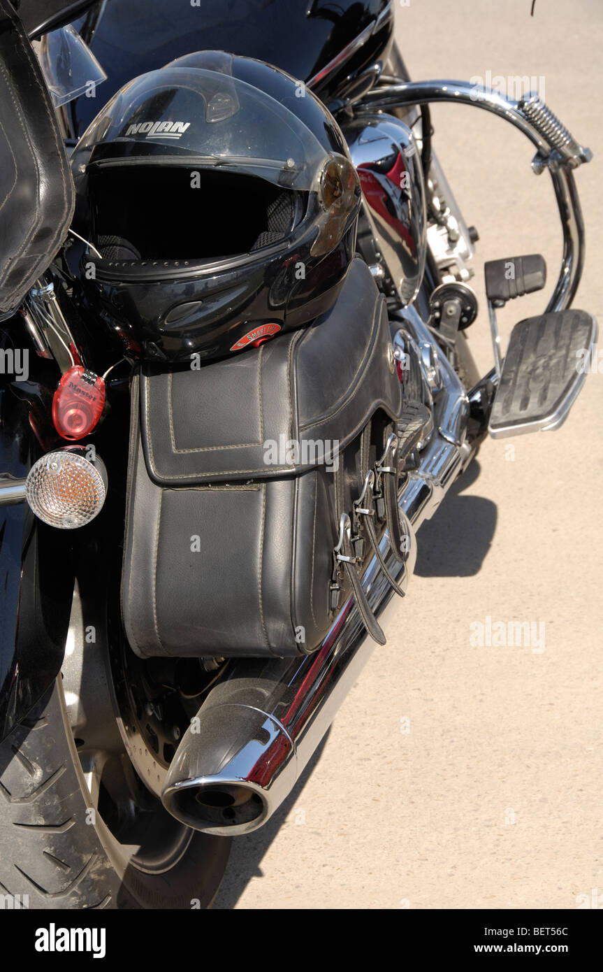 Details and parts of motos. Helmet and exhaust Stock Photo - Alamy