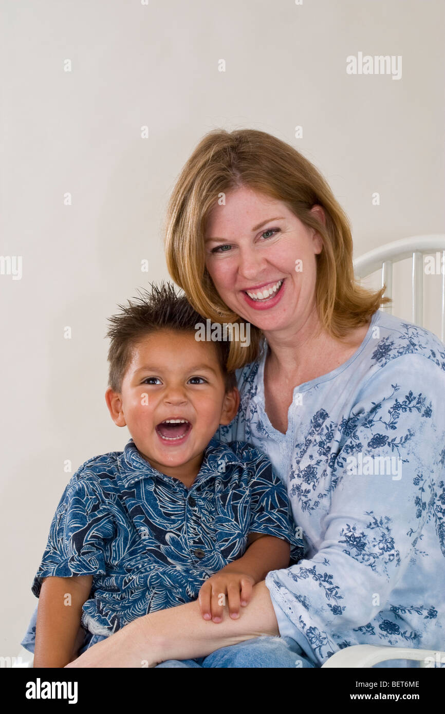 Series of images of a single mom holding her newly adopted 3 year old ...