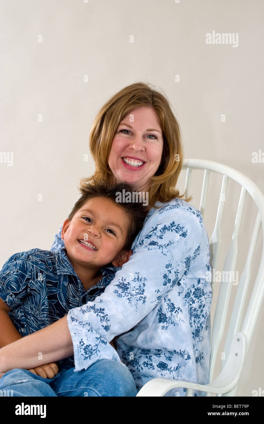 Series of images of a single mom holding her newly adopted 3 year old ...