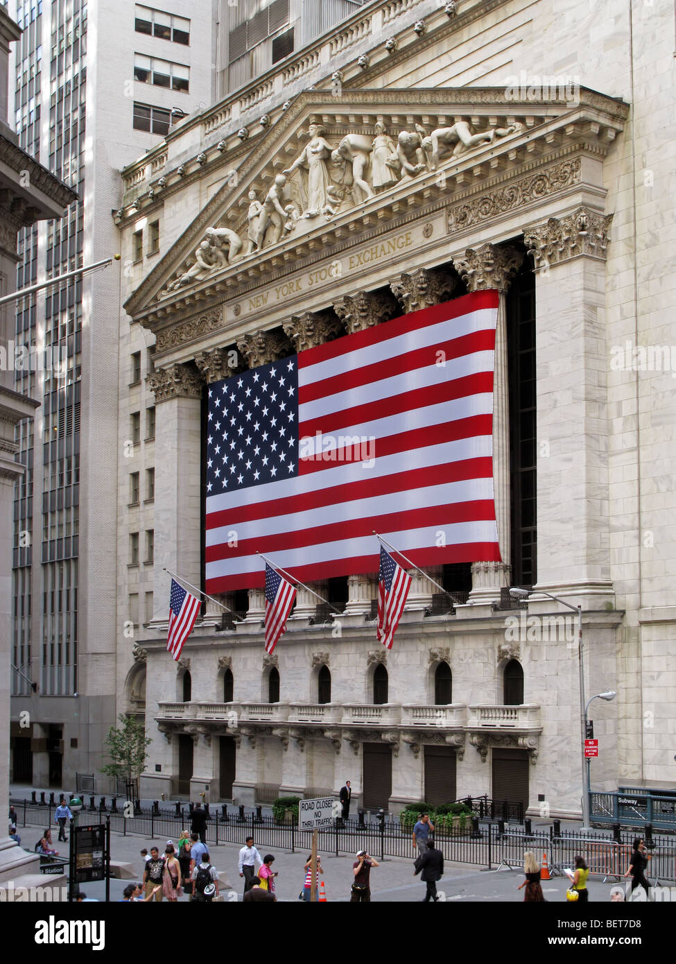 New York Stock Exchange with giant US flag Stock Photo - Alamy