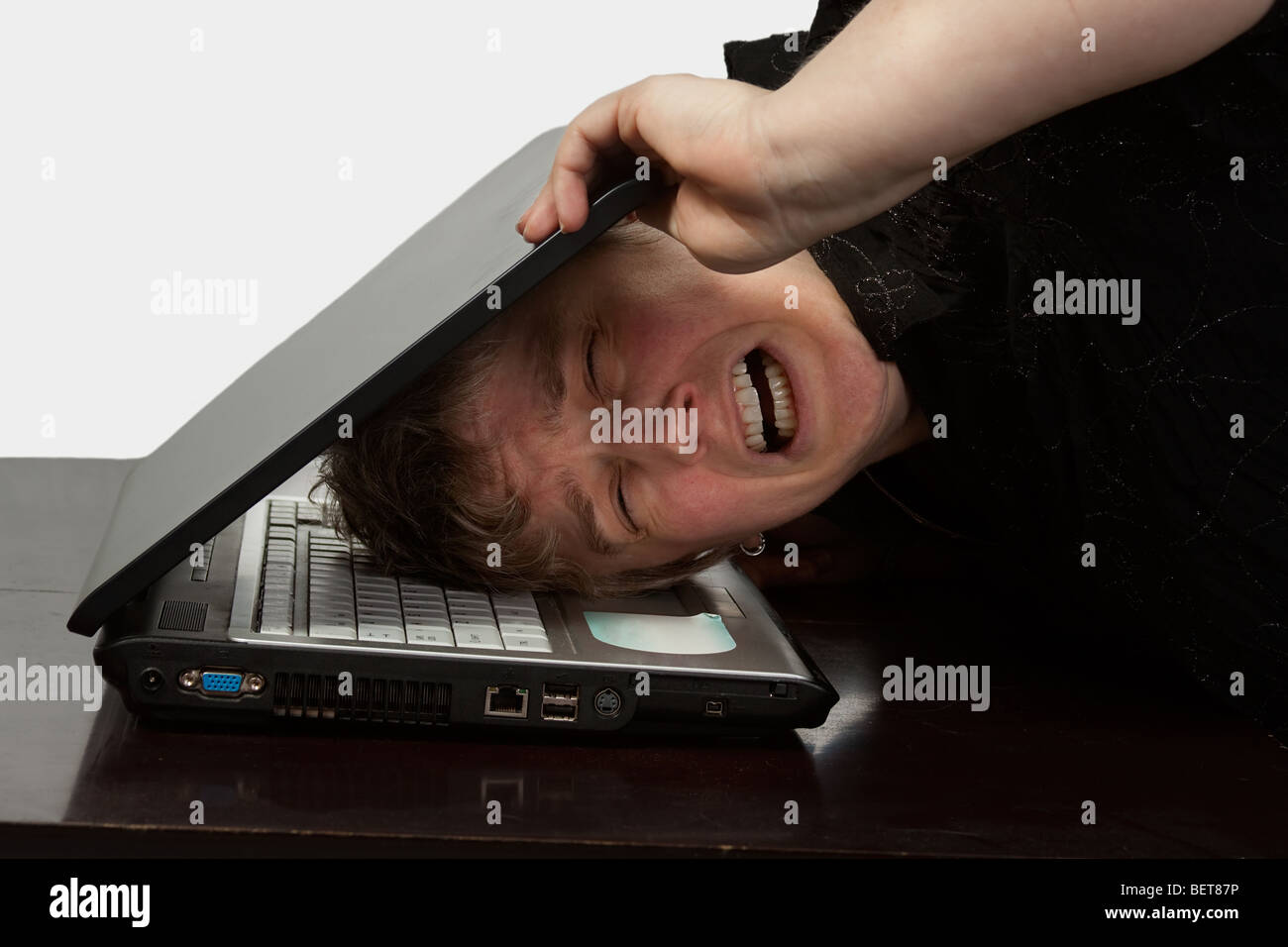 Head in computer Stock Photo - Alamy