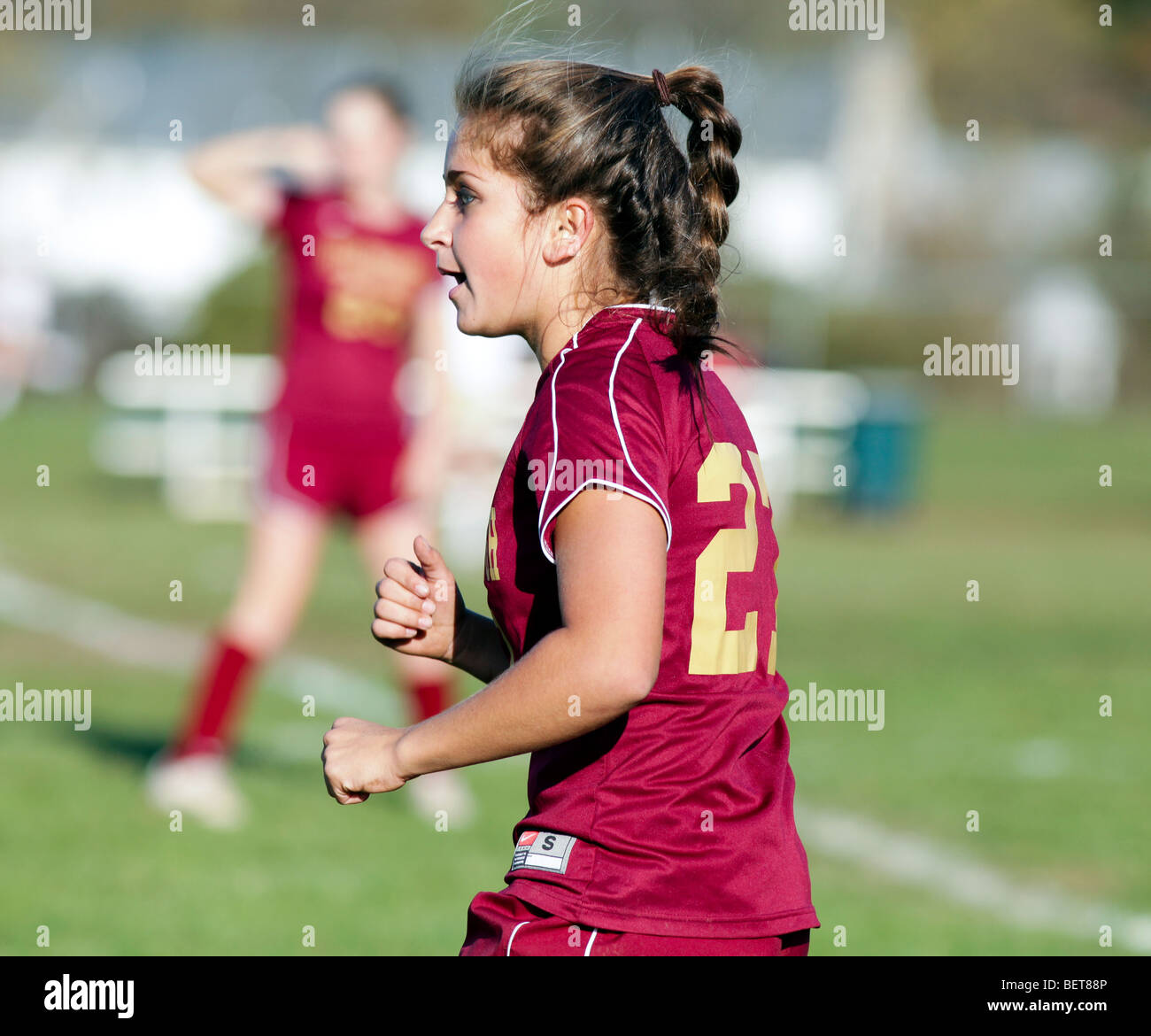 Teenage girls playing high school soccer football Stock Photo - Alamy