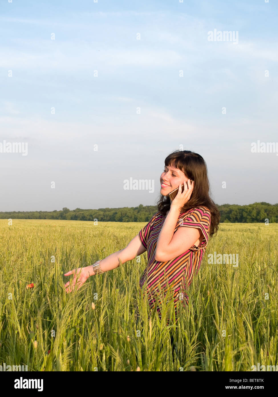 Beautiful Teen Girl Talking Mobile Phone Field Stock Photo - Alamy