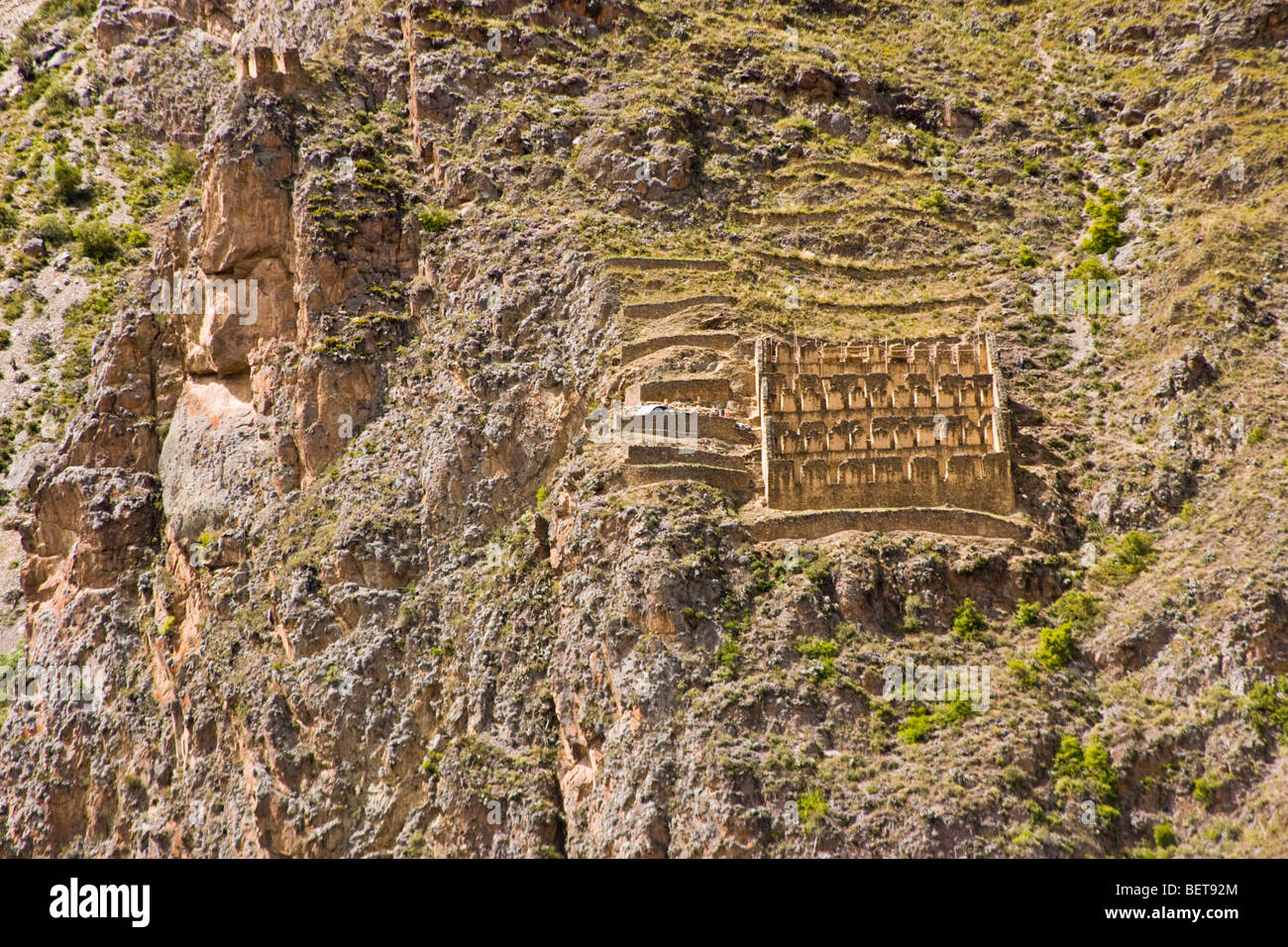 Ancient Inca grain storage on the mountainside overlooking ...