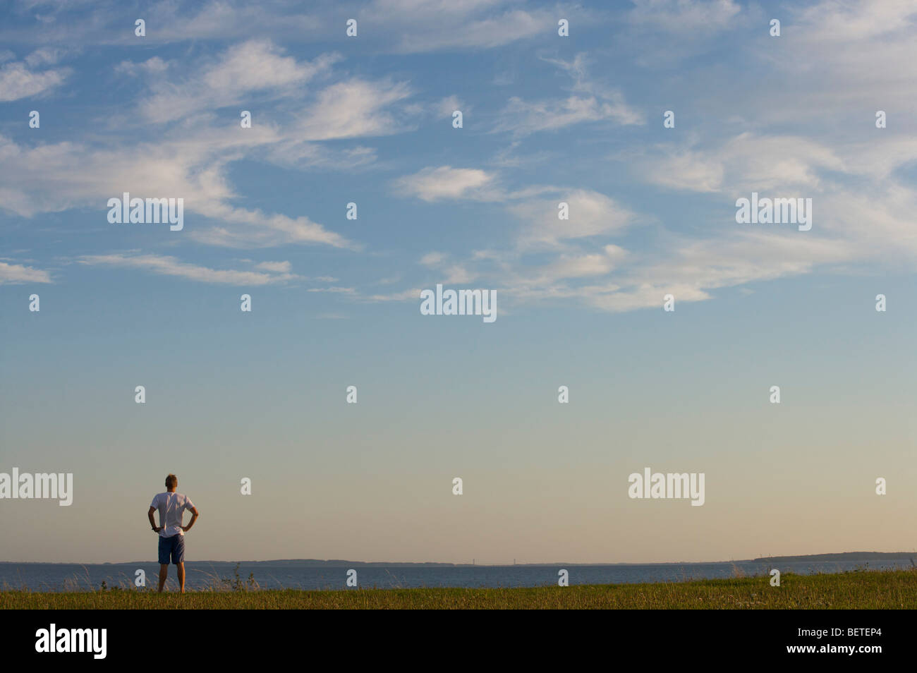 Male taking in the view Stock Photo - Alamy