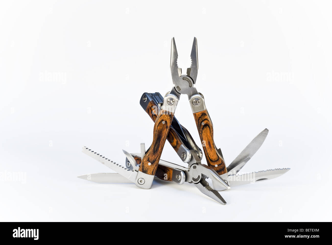 multi purpose pen knife and pliers isolated on the white background ...