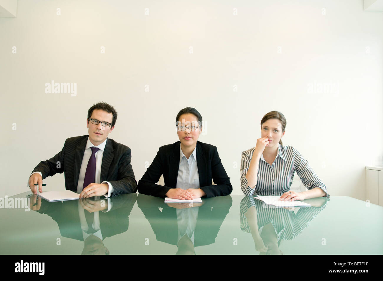 A portrait of a business trio Stock Photo - Alamy