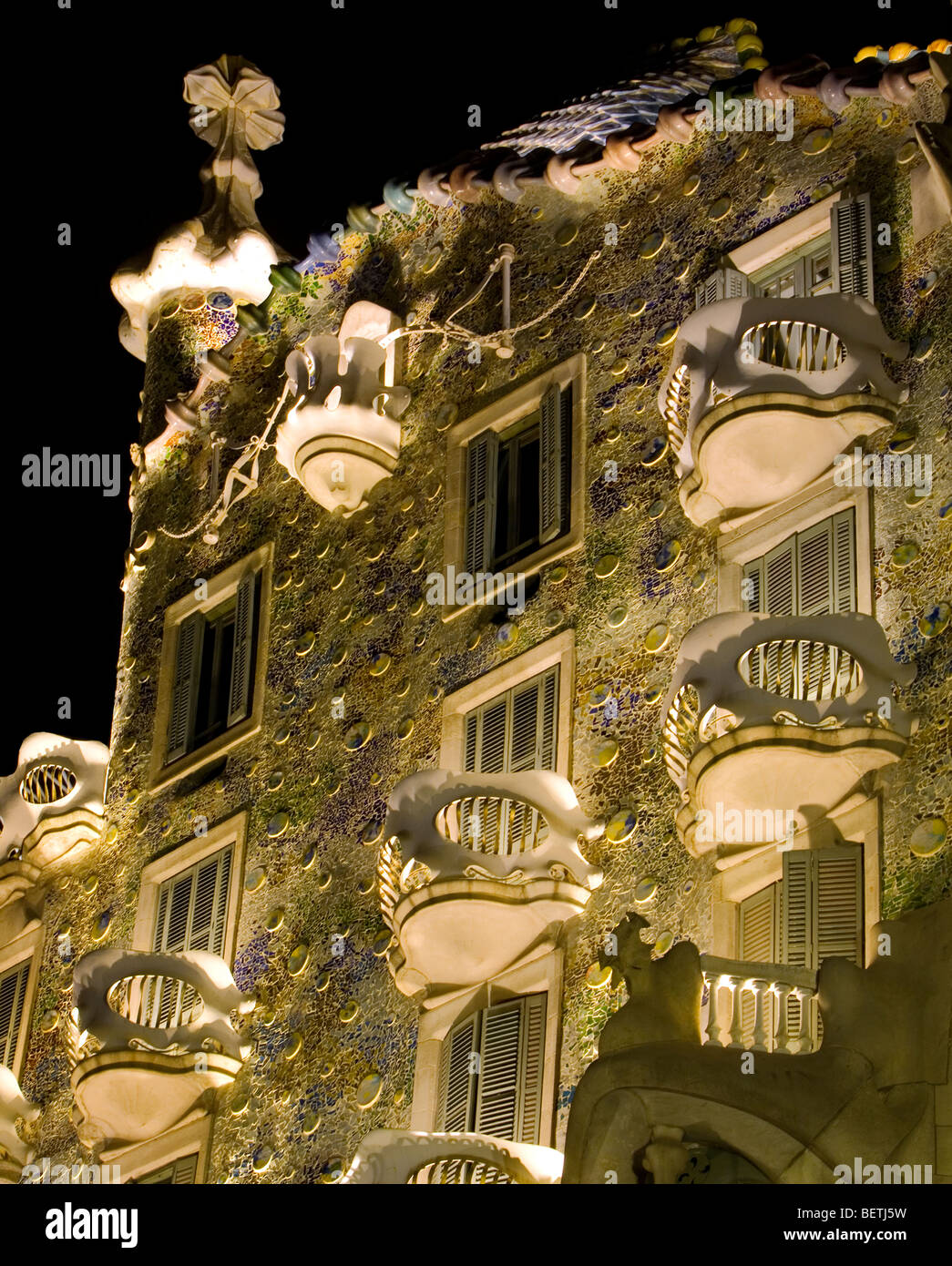 View of the illuminated main facade of the Casa Batlló at night Stock ...