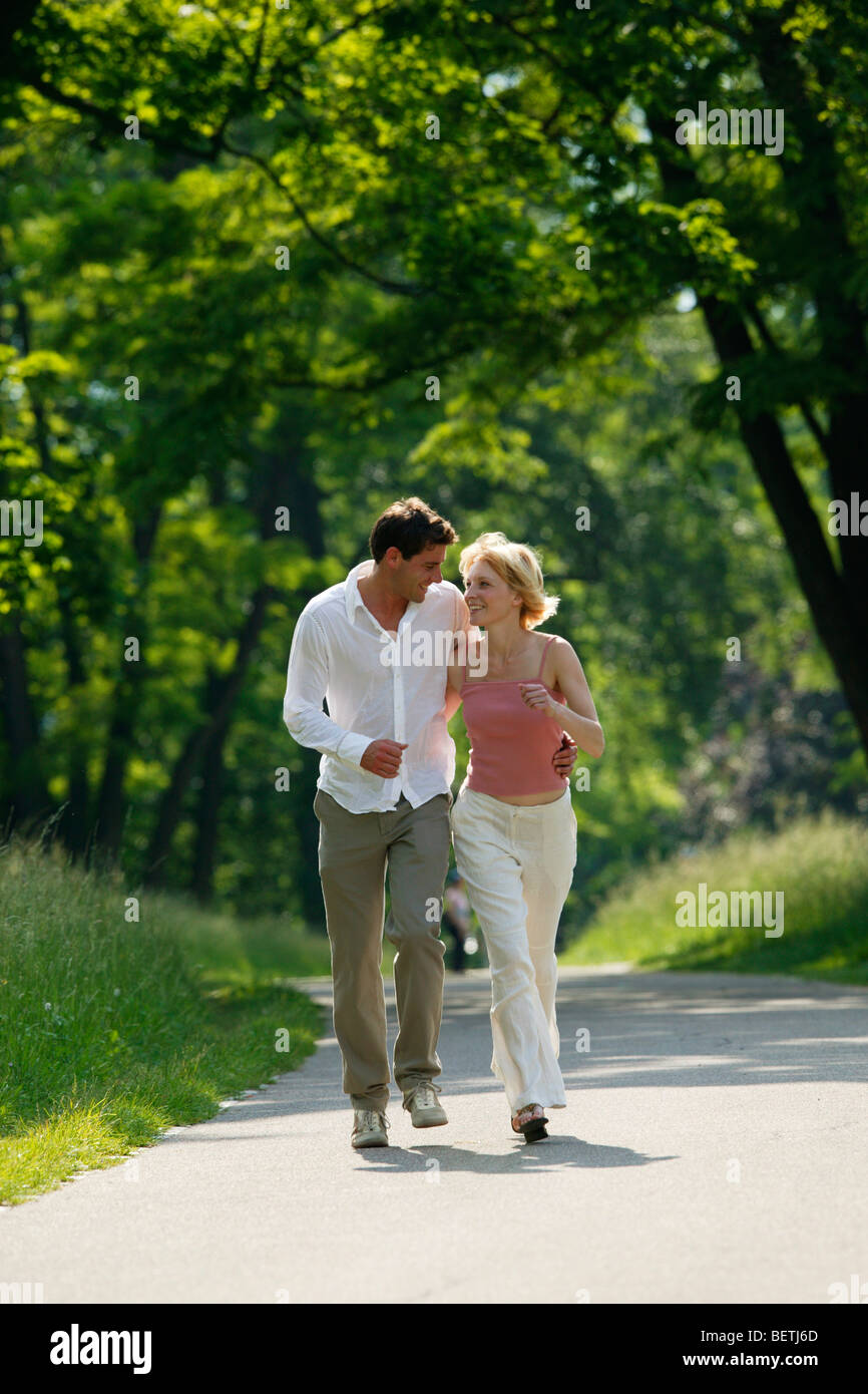 Couple walking together along path pathway hi-res stock photography and ...