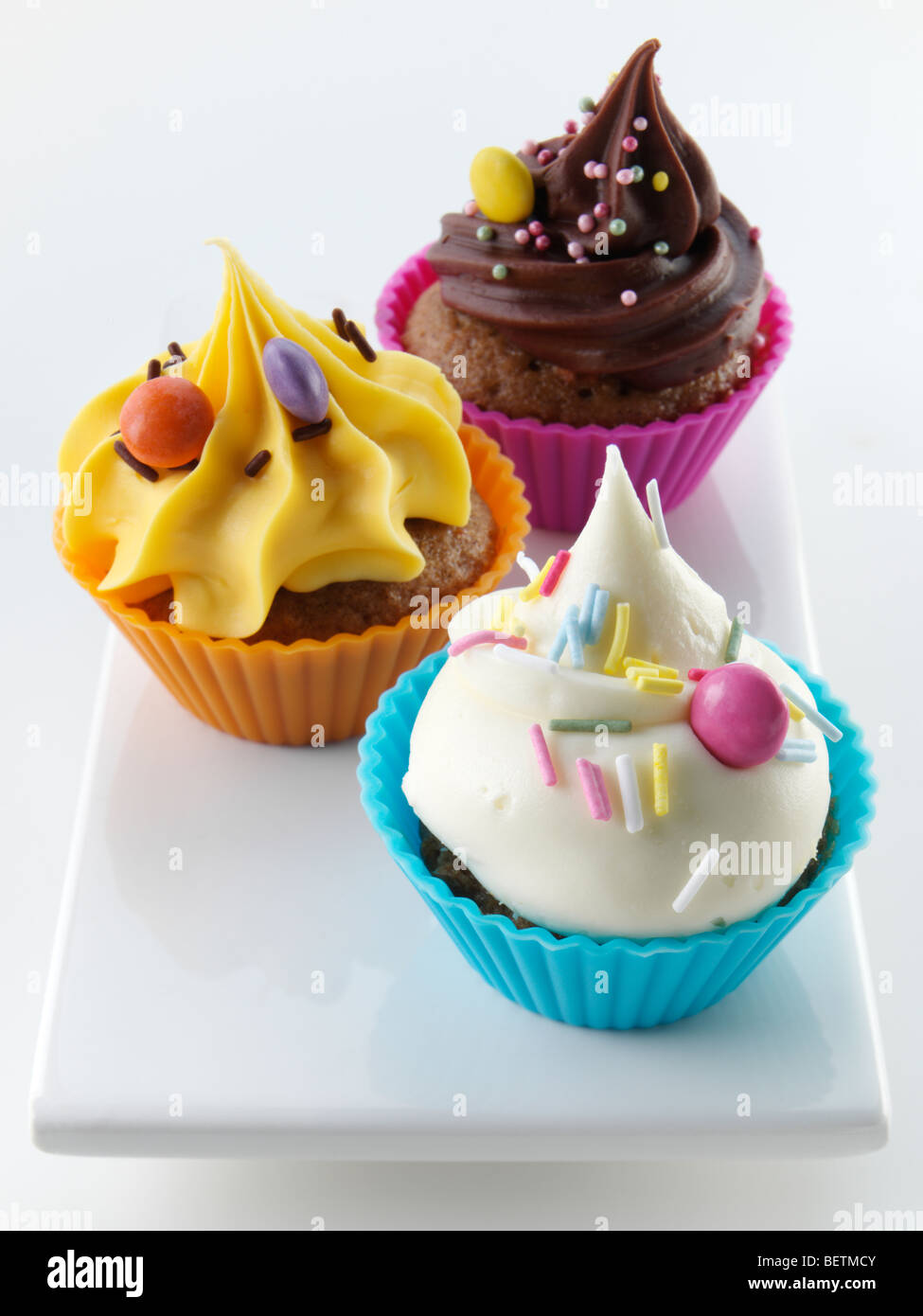 Fairy cakes in colorful cases Stock Photo - Alamy