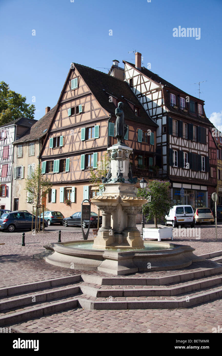 Traditional architecture buildings, street view and fountain in Colmar ...