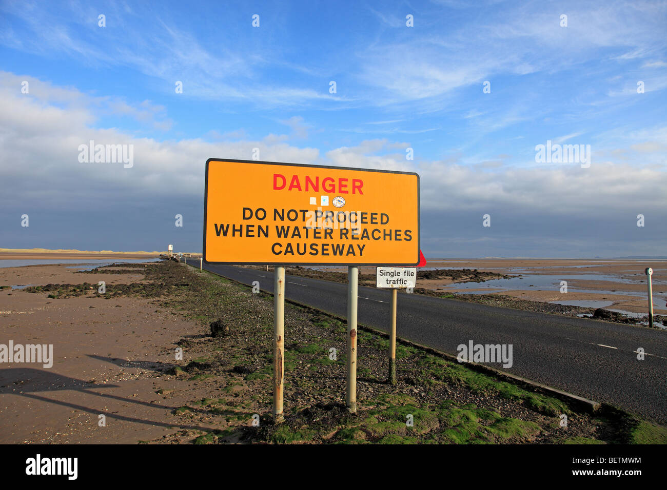 Danger sign on the causeway to Holy Island, Northumberland, England ...