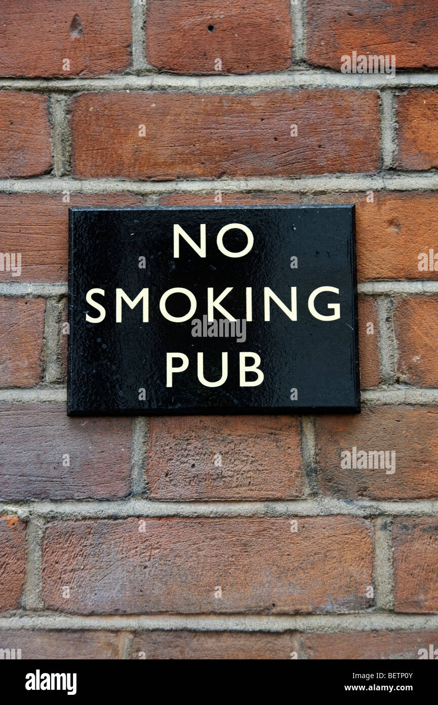 No smoking sign on a pub wall. London. Britain. UK Stock Photo - Alamy