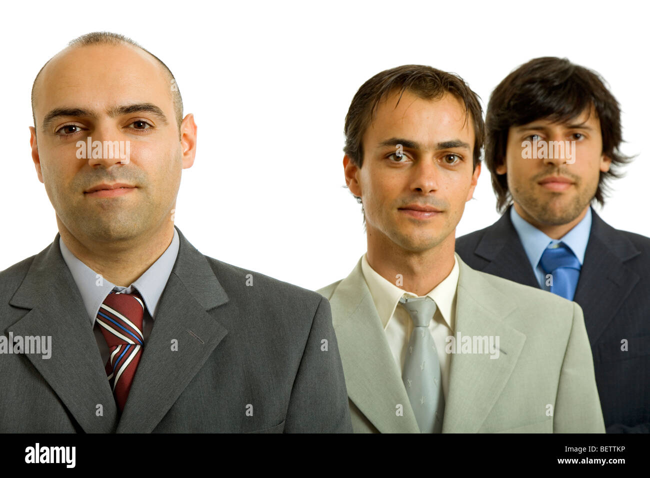 three business men isolated on white background Stock Photo - Alamy