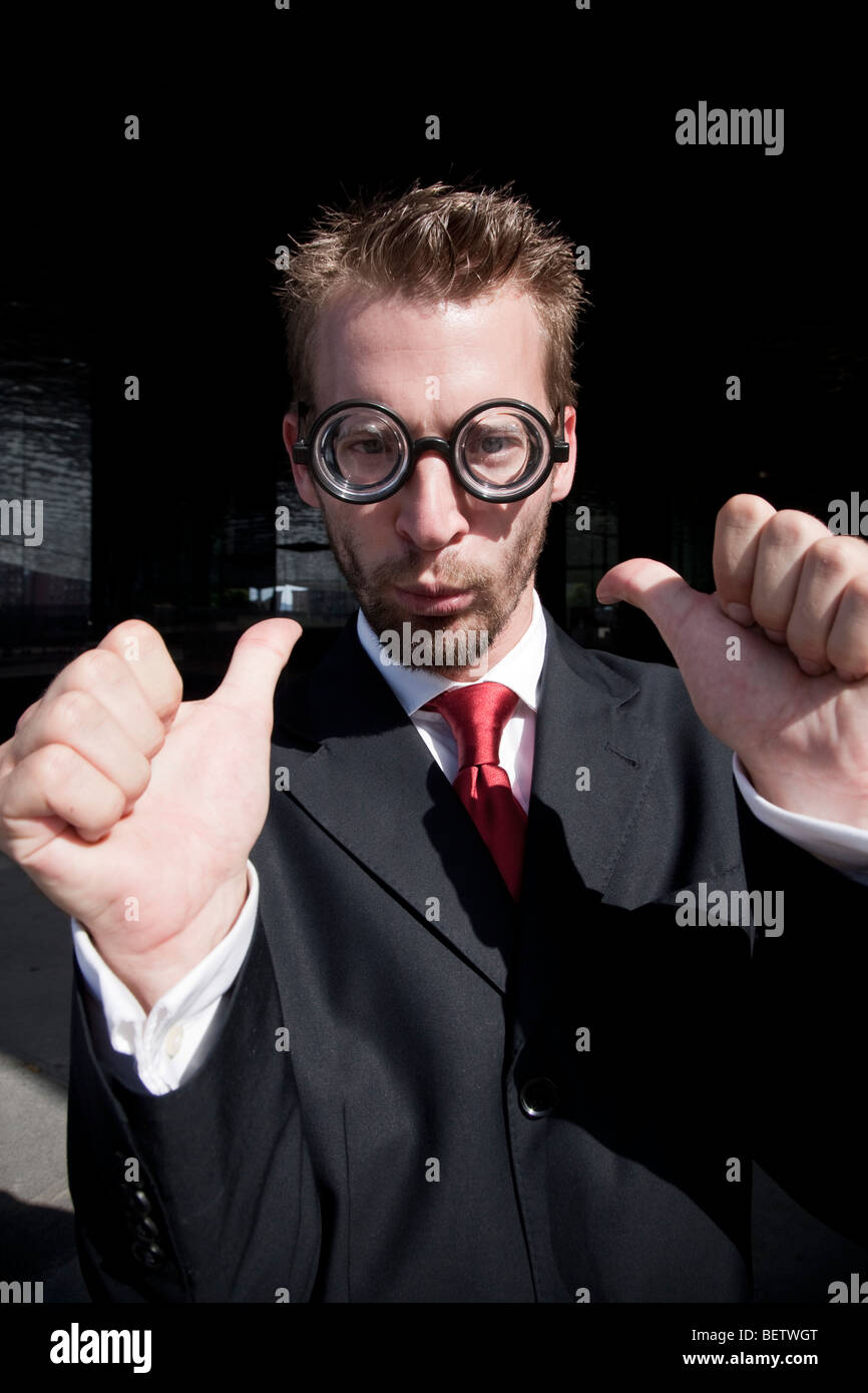 Funny businessman with attitude Stock Photo - Alamy