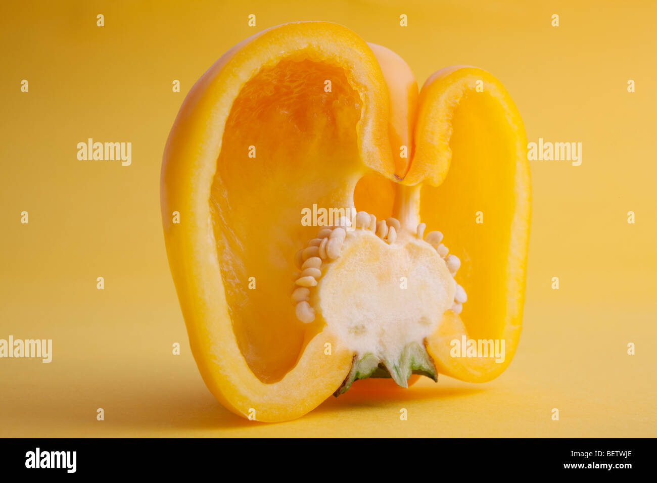 Yellow pepper with seeds hi-res stock photography and images - Alamy