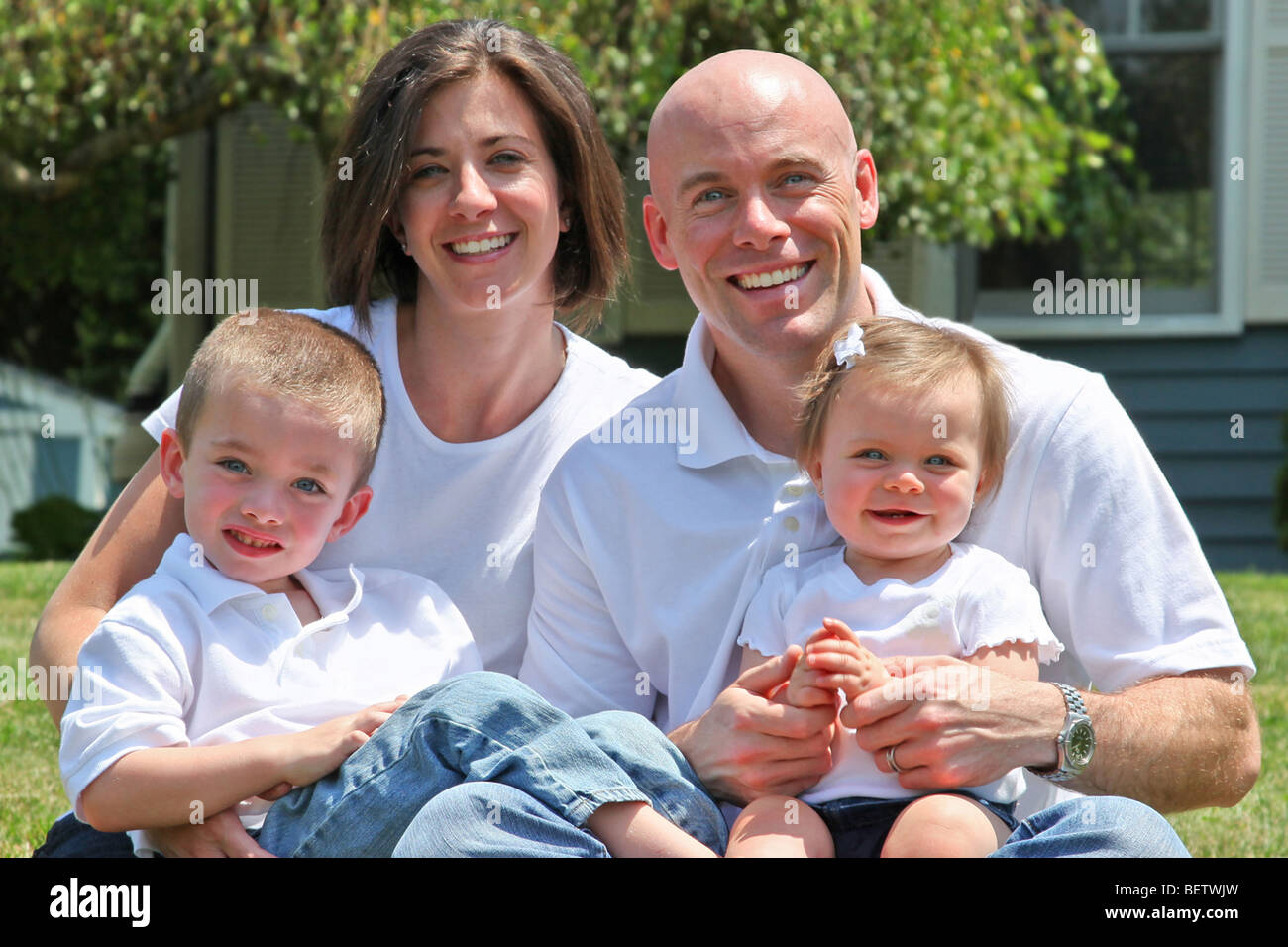 Handsome family portrait Stock Photo - Alamy