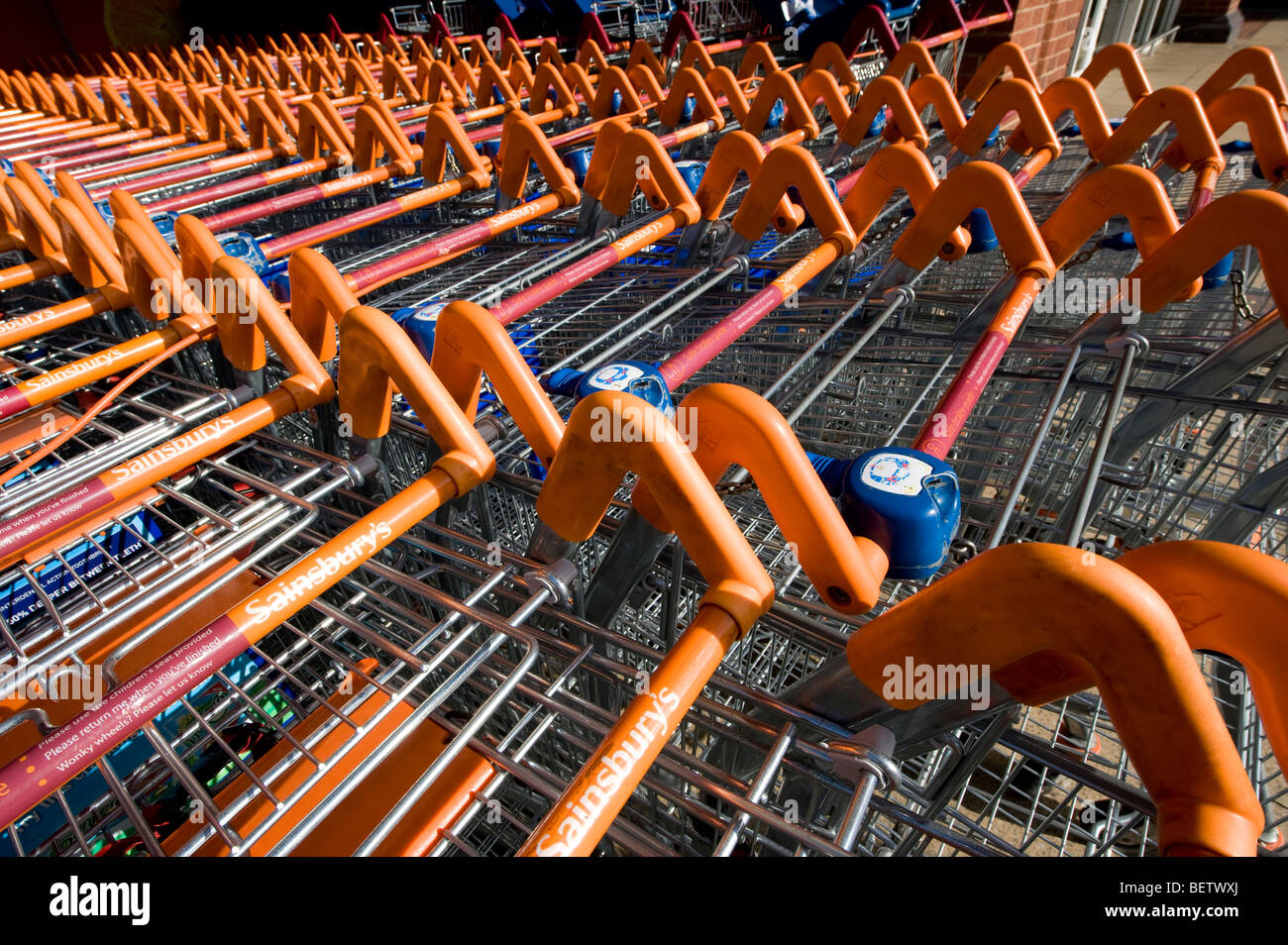 Shopping trolleys outside sainsburys hi-res stock photography and ...