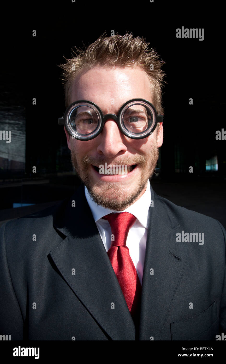 Businessman making a strange face Stock Photo - Alamy