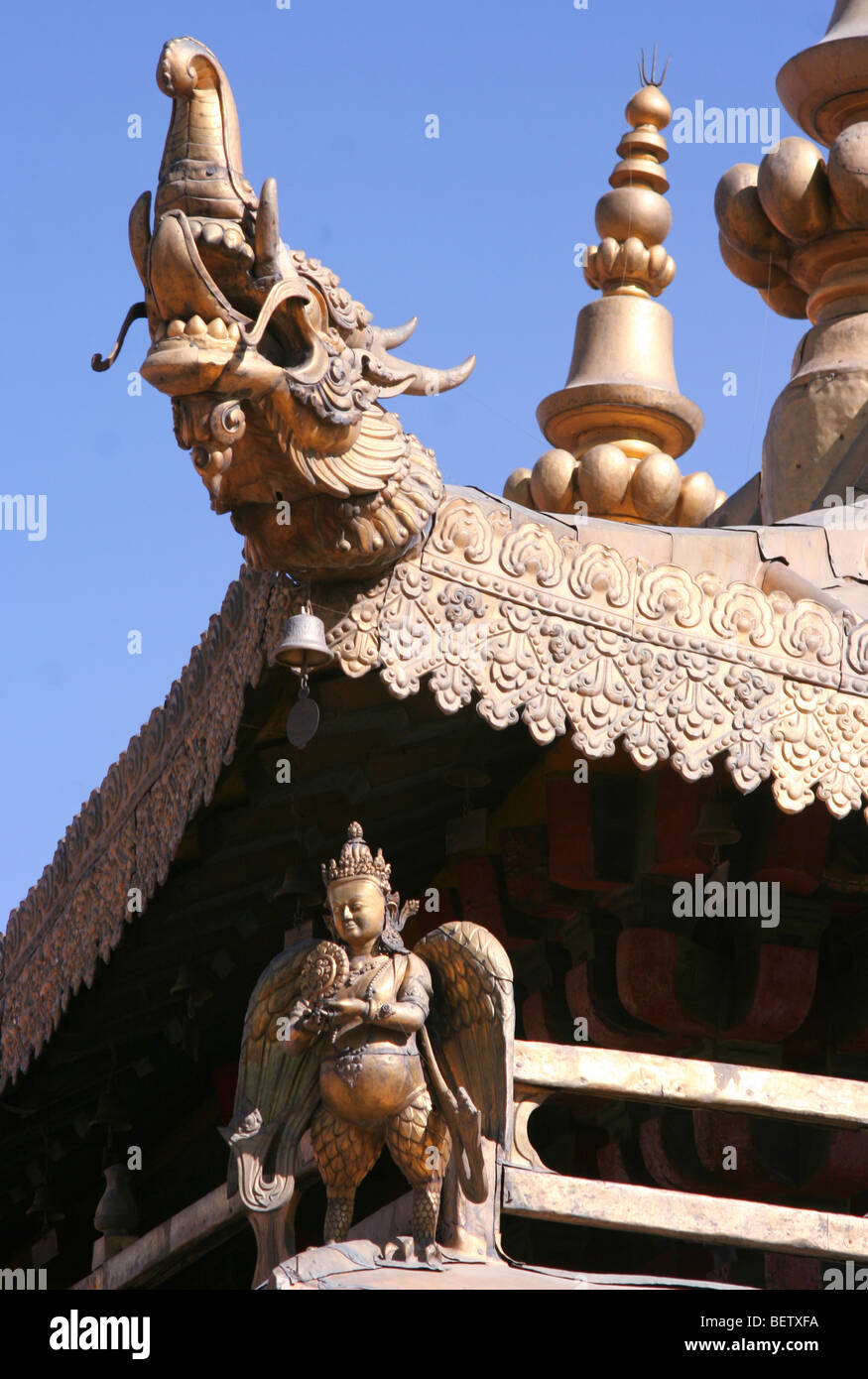 Gilded bronze roof-tops of the Jokhang Temple in Lhasa, Tibet. The ...