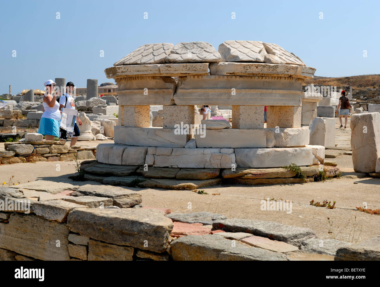 The small circular marble building in the square of the Agora of the ...