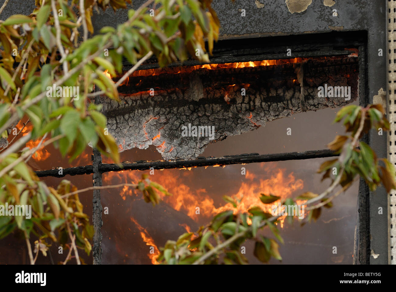 flames at window of burning office block Stock Photo - Alamy