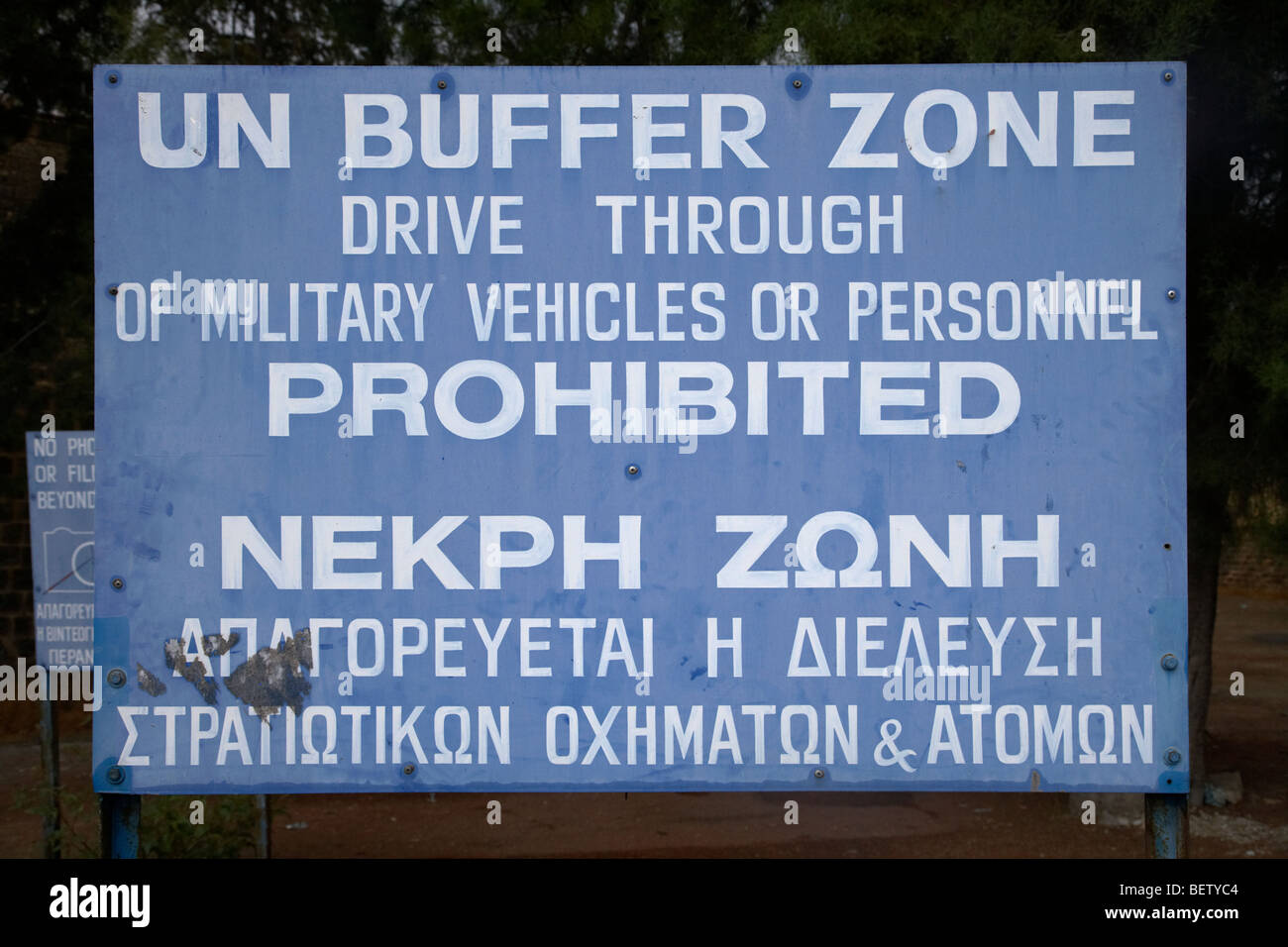 warning sign for restricted area of the UN buffer zone in the green ...