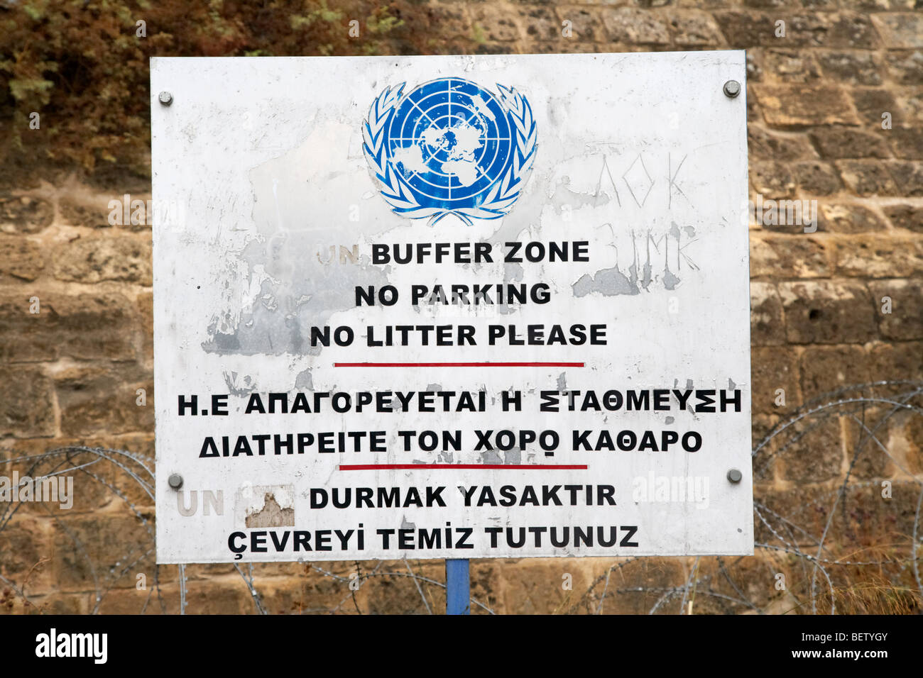 UN buffer zone no parking no litter sign in the green line dividing ...