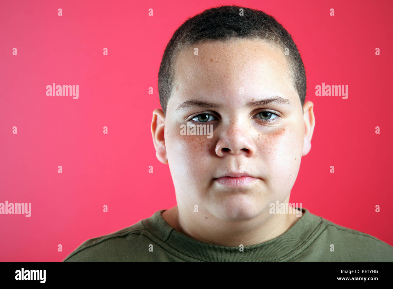 Unsmiling sad boy hi-res stock photography and images - Alamy