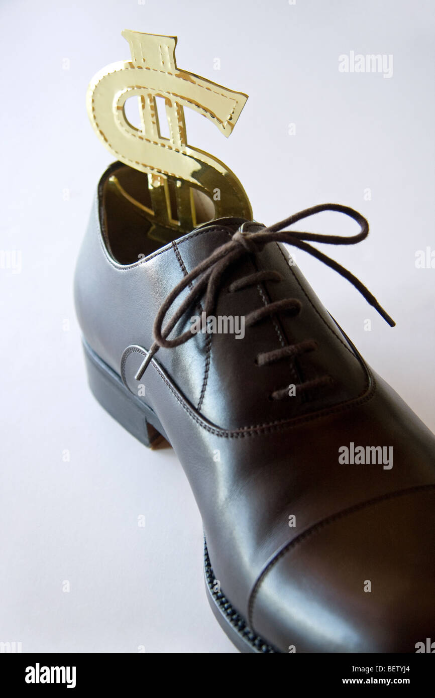Small business standing in bigger shoes Stock Photo - Alamy