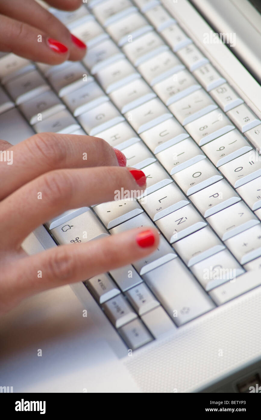 hands typing on keyboard Stock Photo - Alamy