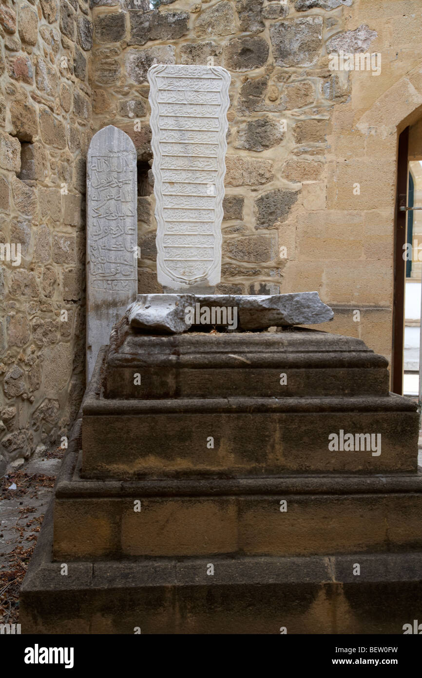 islamic tomb grave with gravestone in the grounds of a mosque in ...