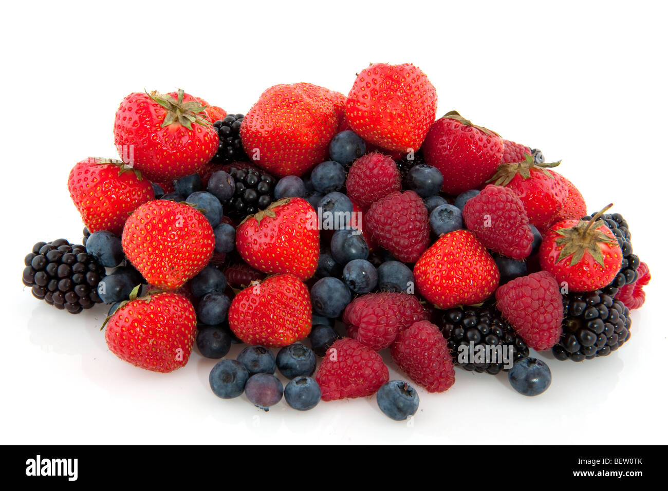 Diversity fresh forest fruit isolated over white Stock Photo - Alamy