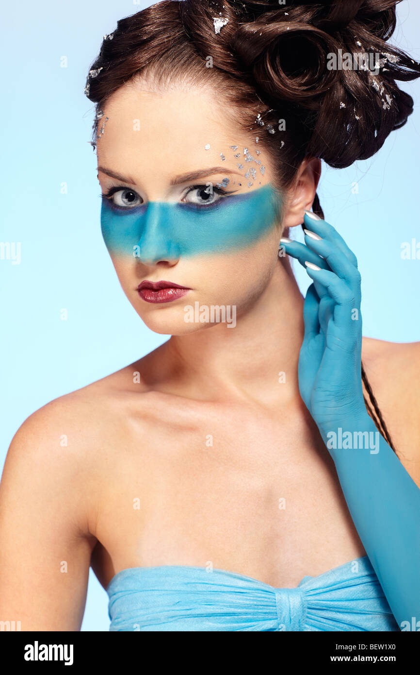 portrait of beautiful girl with blue stripe facial bodyart Stock Photo ...