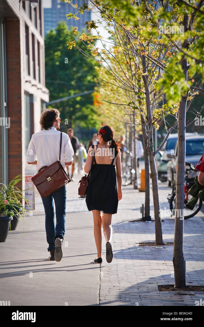 Young couple walking together, spring Stock Photo - Alamy