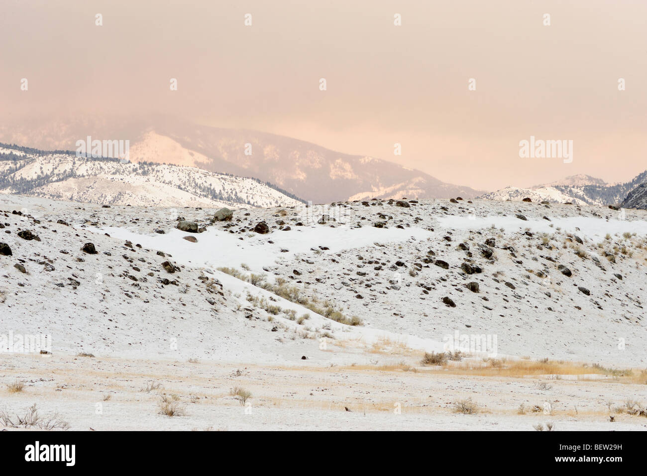 Dawn light breaking through clouds in Yellowstone River valley ...
