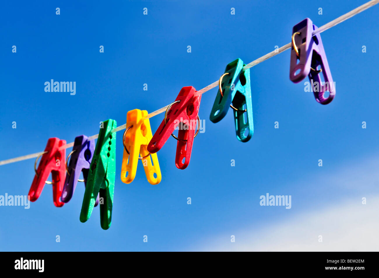 Yellow plastic spring clothes peg hi-res stock photography and images ...