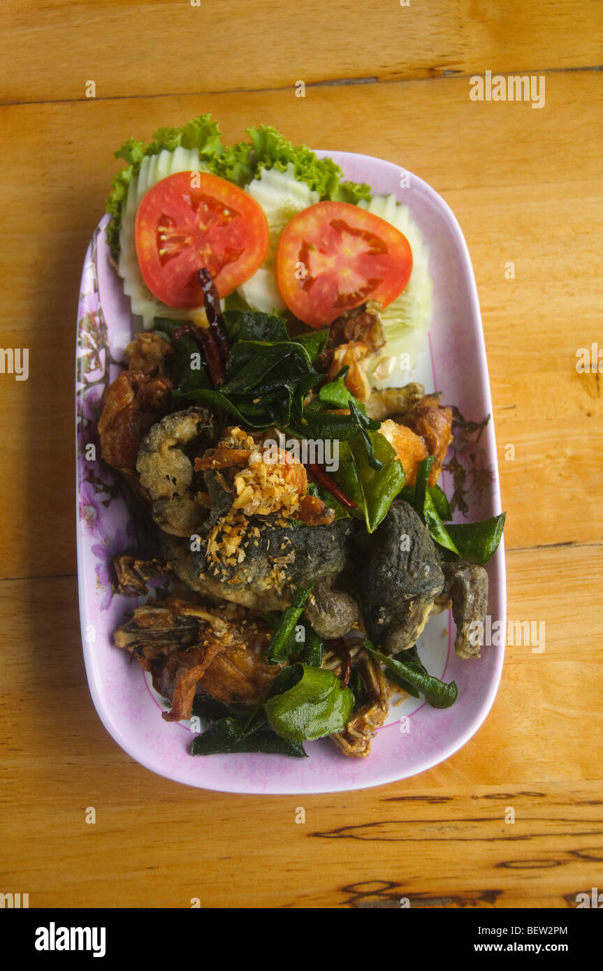 grilled frog in a restaurant at the Chatuchak Weekend Market in Bangkok ...