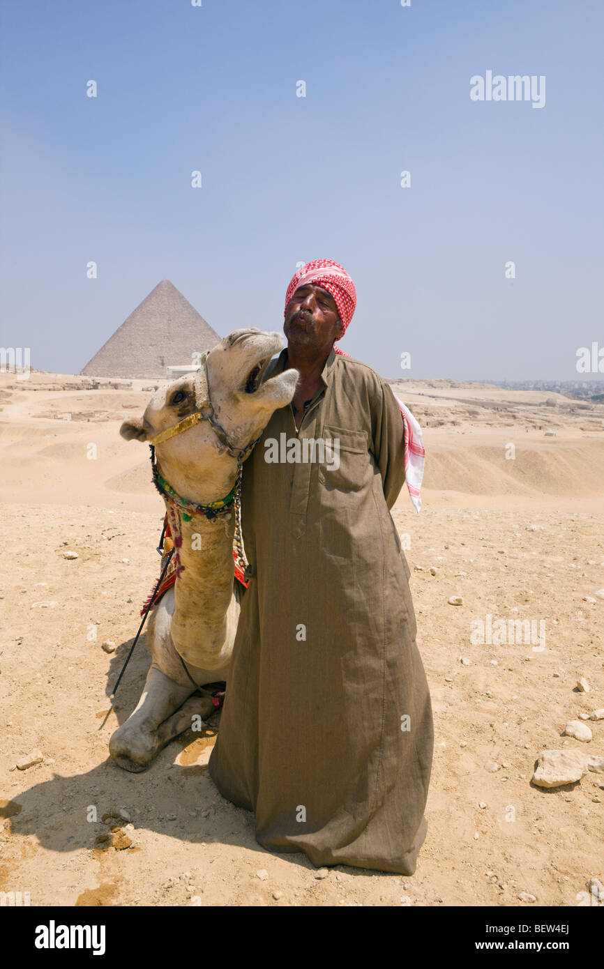 Camel Driver in Front of Pyramid of Cheops, Cairo, Egypt Stock Photo ...