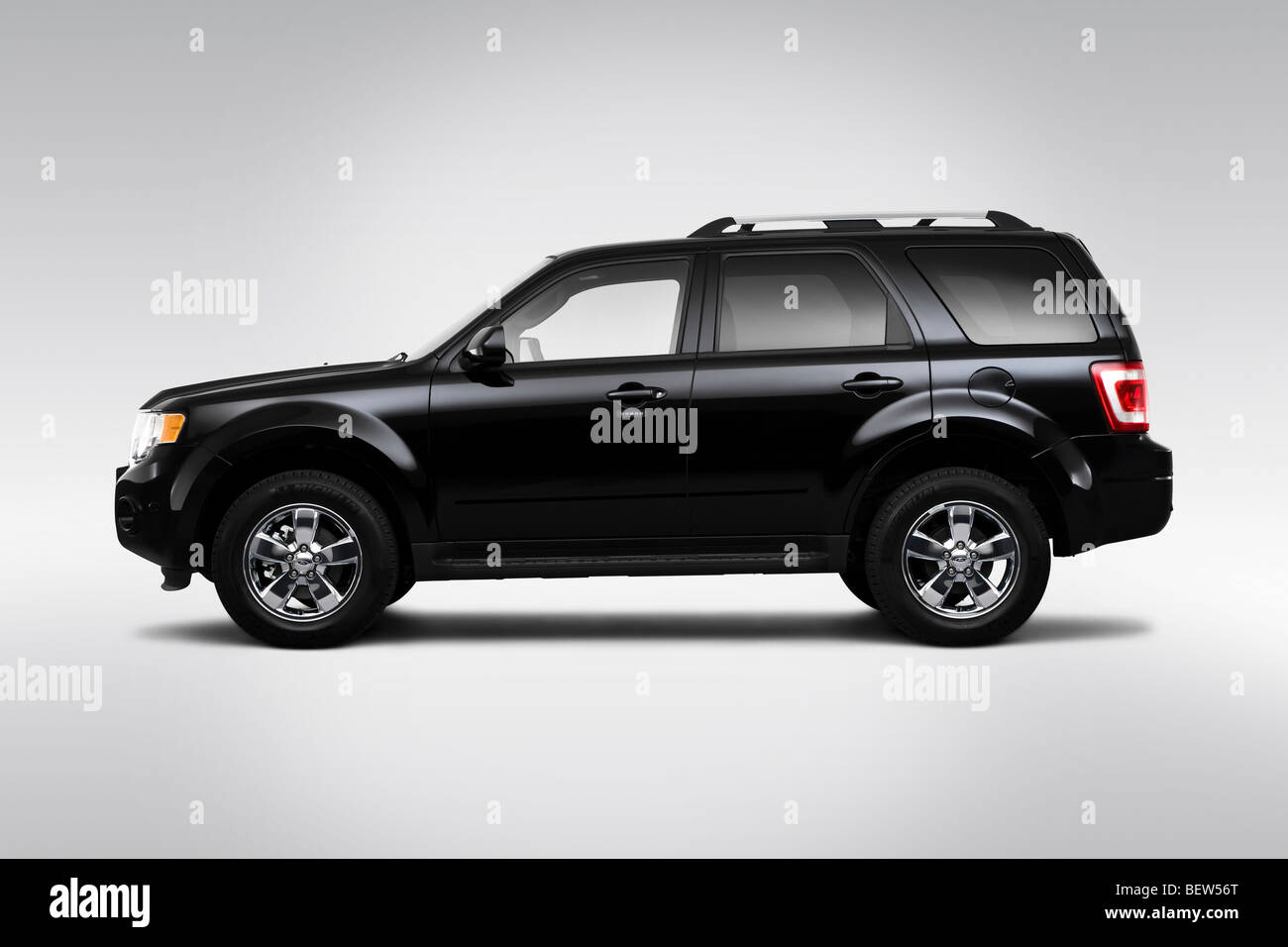 2010 Ford Escape Limited in Black - Drivers Side Profile Stock Photo ...
