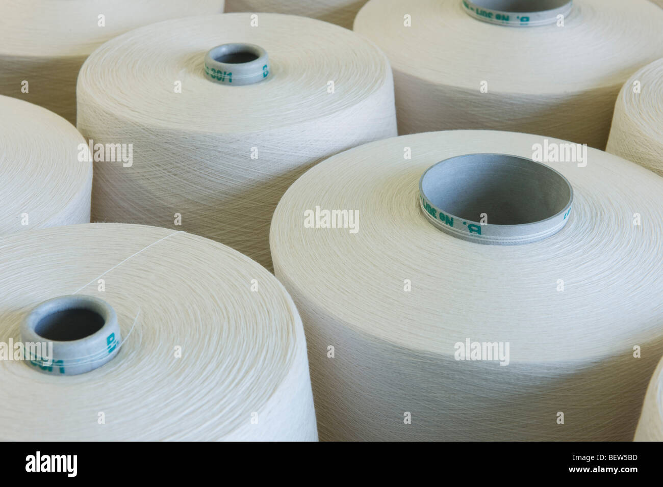 Spinning factory materials Stock Photo - Alamy