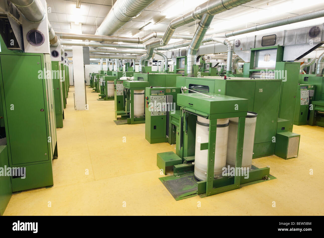 Spinning factory machinery Stock Photo - Alamy
