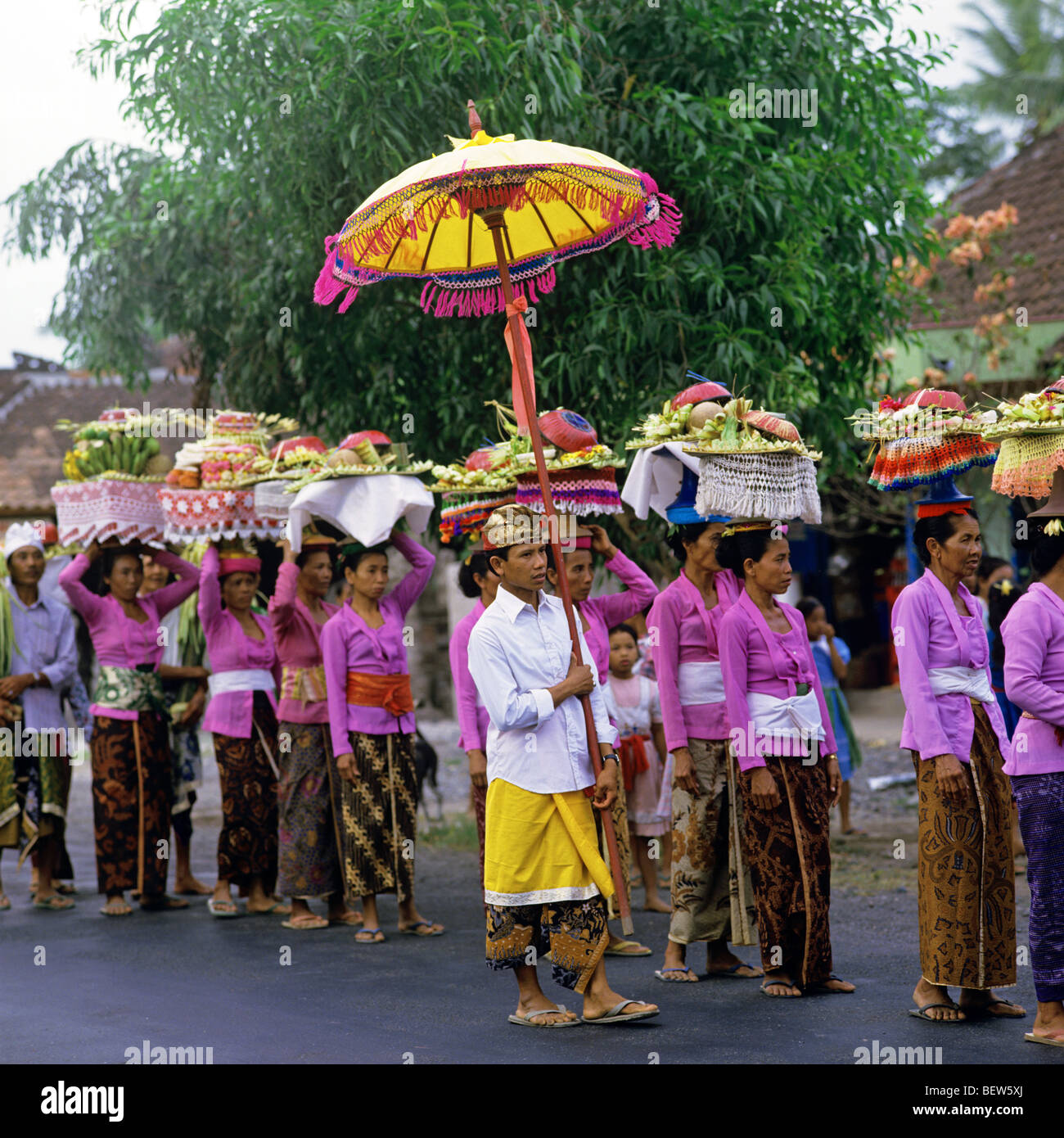Locals taking part in a Temple Procession on the island of Bali Stock ...