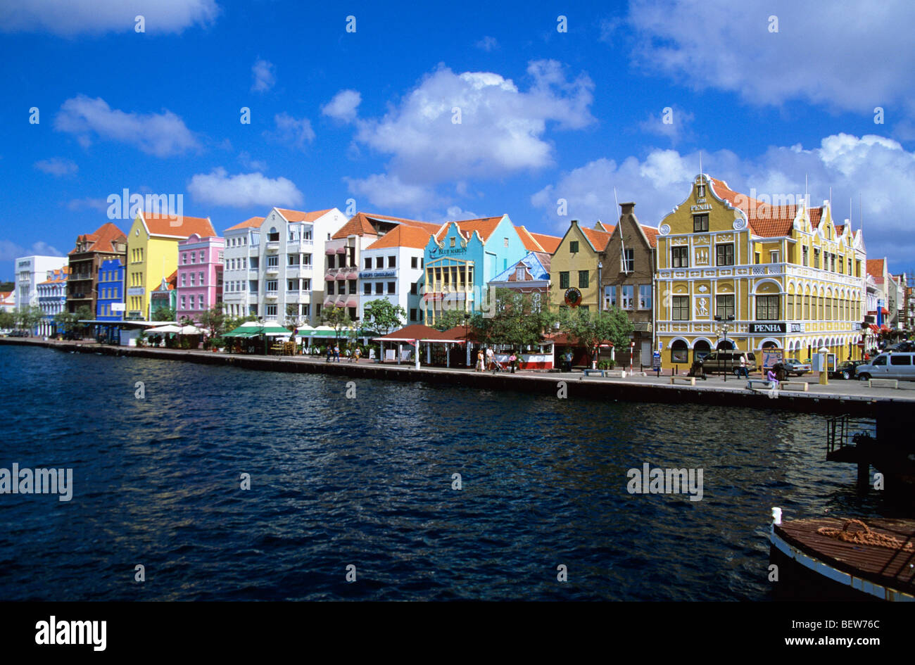 Old Colonial buildings line the waterfront at Willemstad, the capital ...