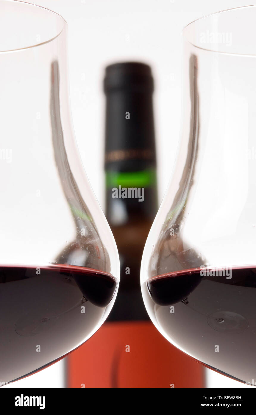 Two filled claret glasses in front of wine bottle, cross-section Stock ...