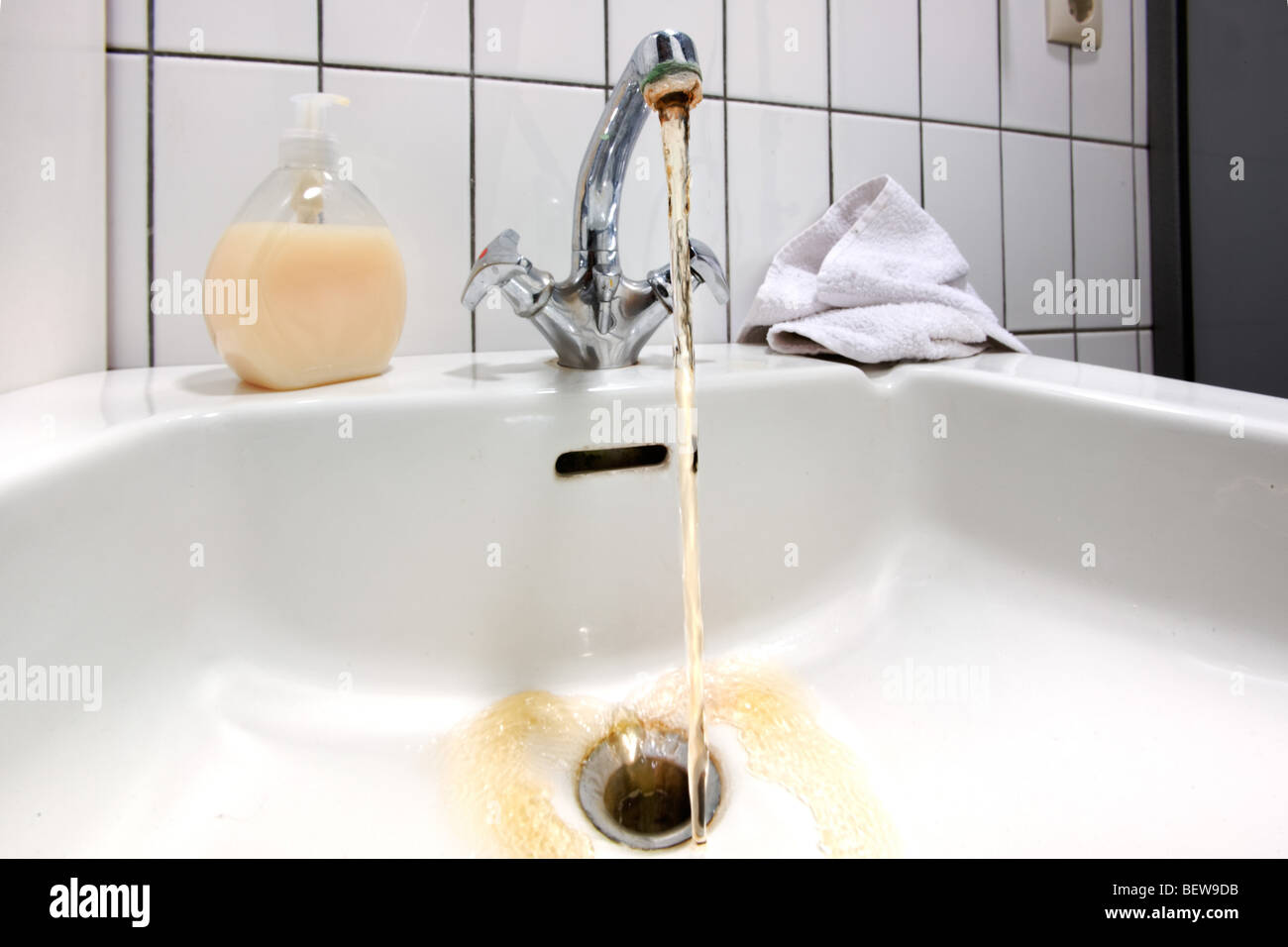 jet of water out of tap, close-up Stock Photo - Alamy
