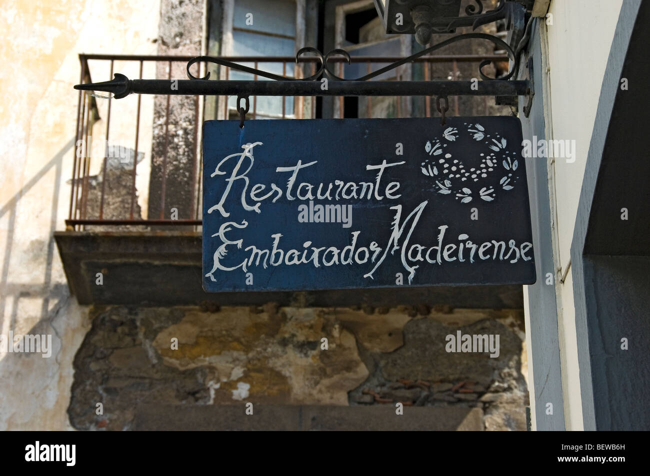 Close up of sign on wall for traditional Madeiran restaurant Funchal ...