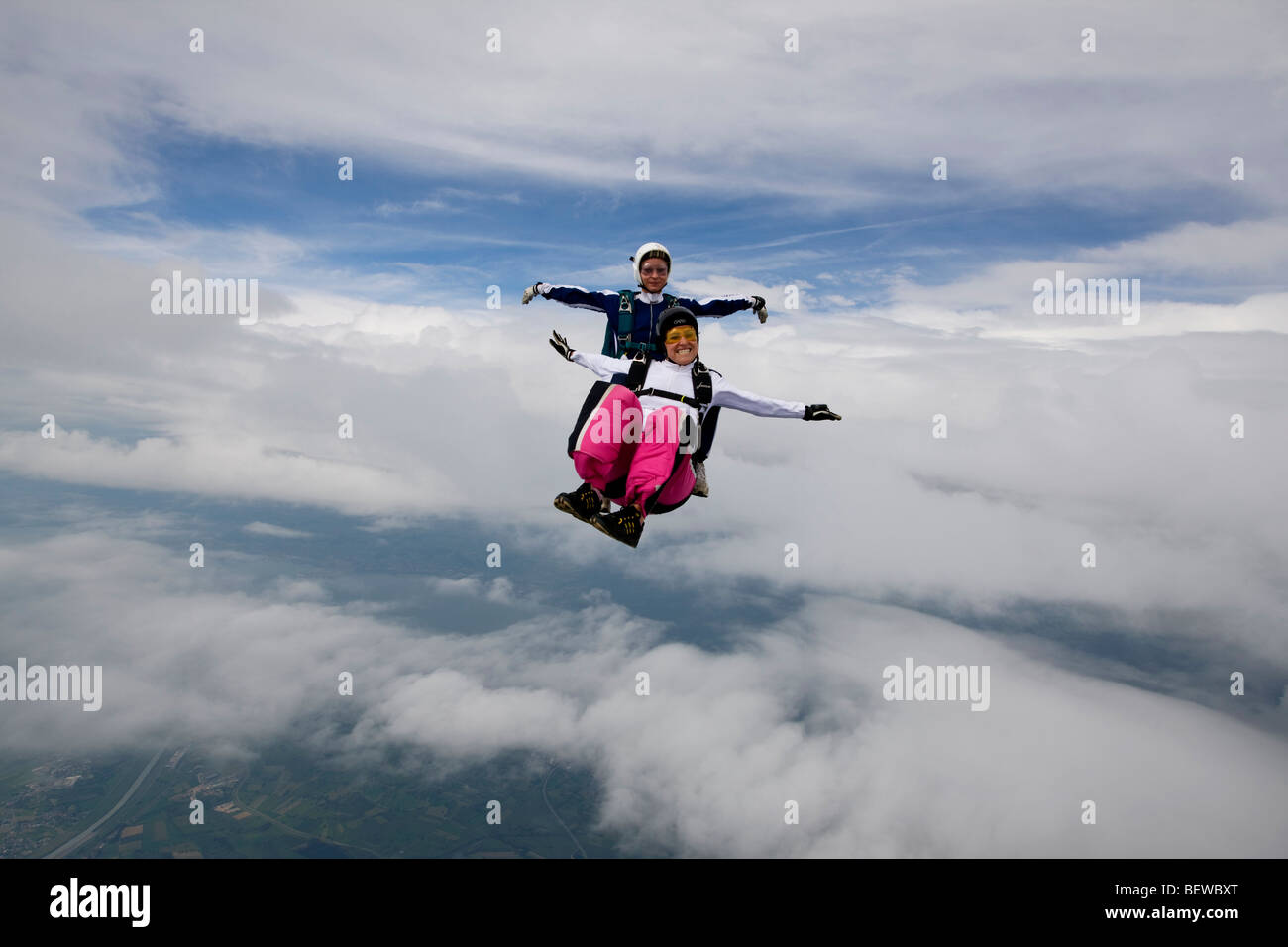 two people doing parachute jumping, full shot Stock Photo - Alamy